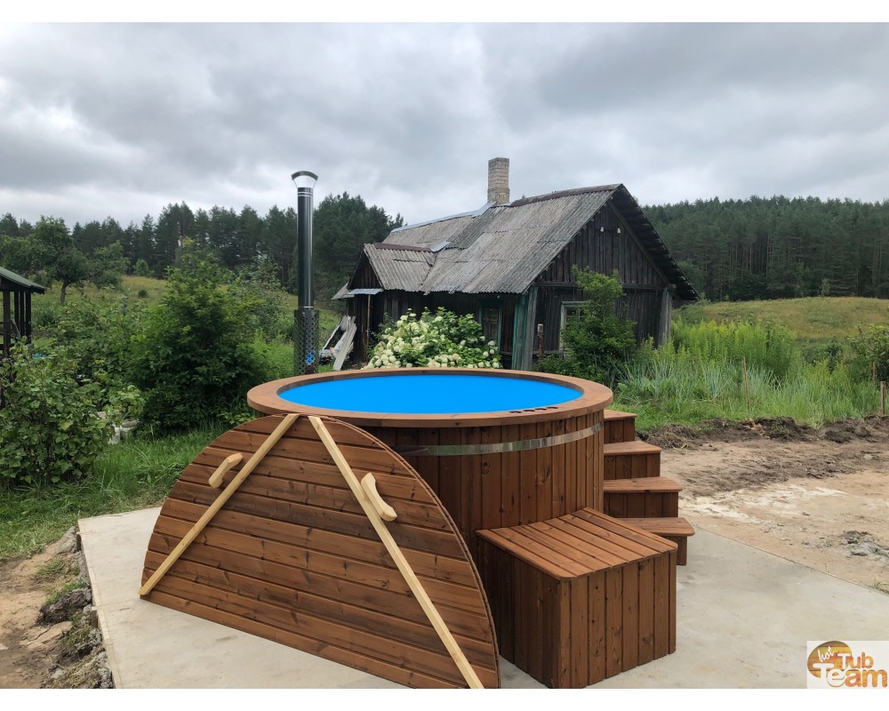 Plastic hot tub with external stove